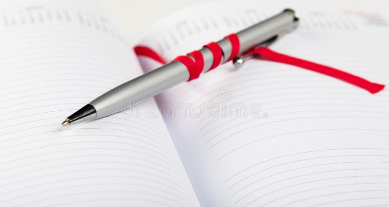 Pen on Notebook with Red String Stock Image - Image of note, sign: 54592911
