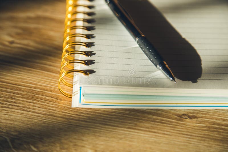 Pen and Notebook on the Table Stock Photo - Image of concept, pencil ...