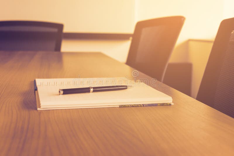 Pen on Notepad for Agenda Kept on Table in Corporate Conference Room ...