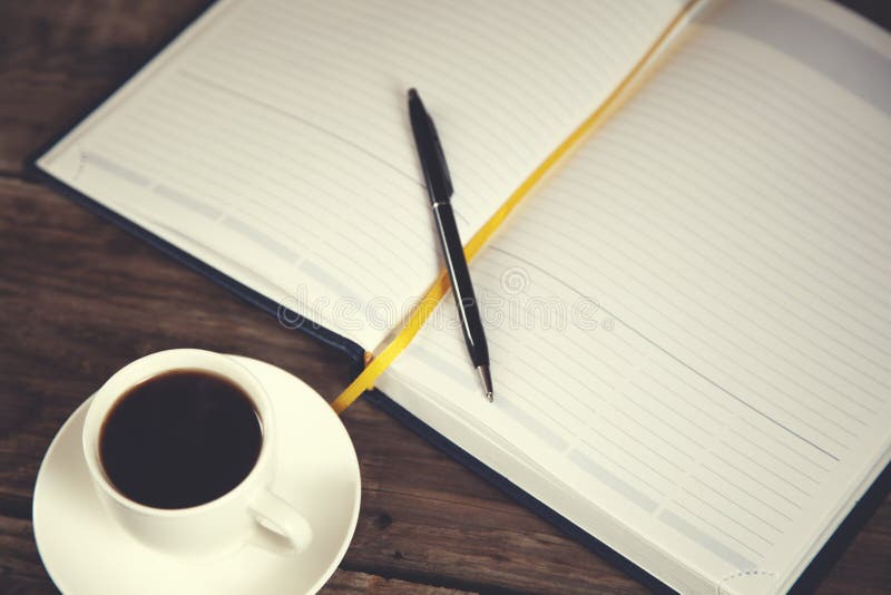 Pen on notepad and coffee stock photo. Image of blank - 132666348