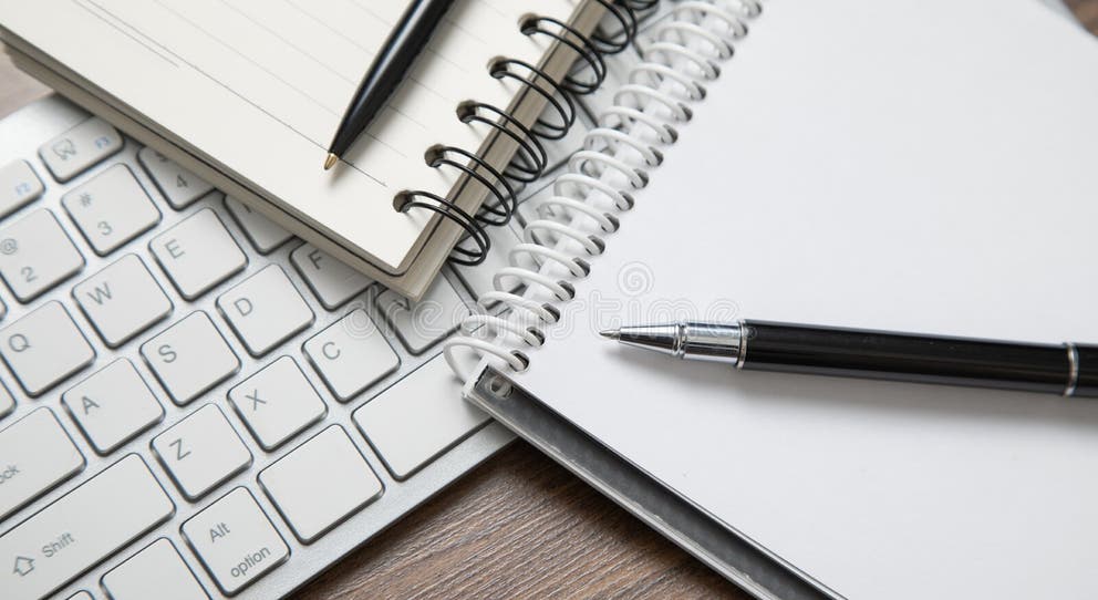 Pen and Notepad on the Computer Keyboard Stock Image - Image of ...