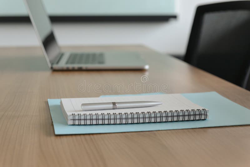 Pen on Notepad and Laptop and for Agenda Kept on Table in Empty ...