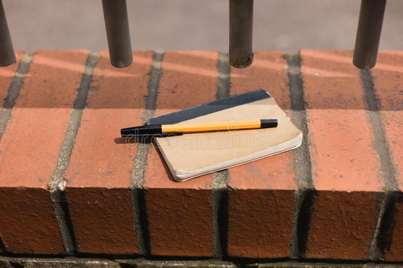 Pen and notepad outside stock image. Image of concept - 55457135