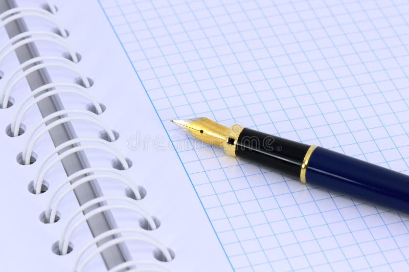 Pen on an open notebook stock photo. Image of education - 52068778
