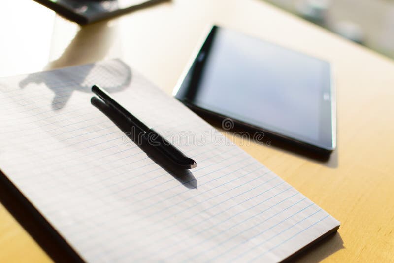Pen, Paper and Tablet on Table Stock Image - Image of ipad, depth: 41886325