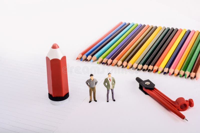 Pen, Pencils, Compass and Two Figurine Stock Image - Image of teaching ...