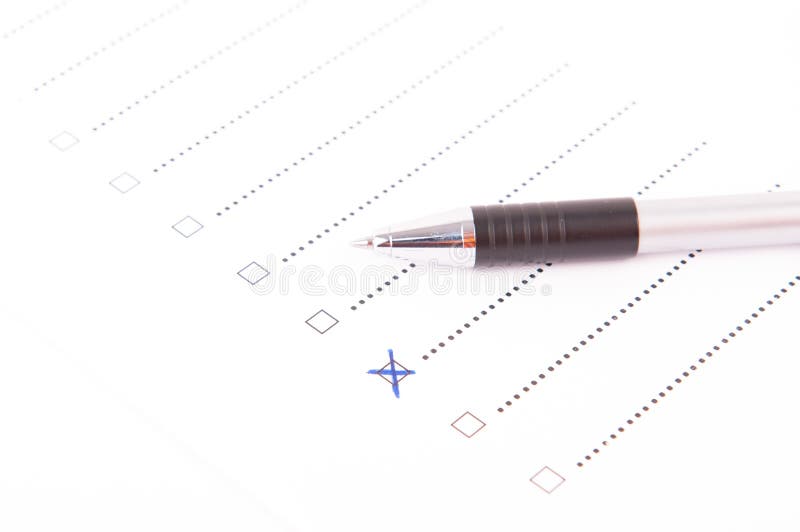 A pen on a questionnaire stock photo. Image of option - 64839902