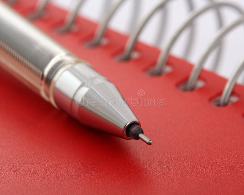 Pen on Red Notebook stock photo. Image of instruction, book - 857246