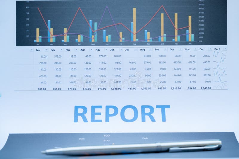 Pen on Report Document about the Charts, Graphs and Showing the Results ...