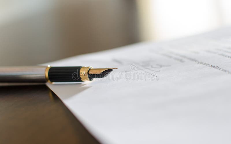 Pen on a signed contract stock image. Image of legal - 49549507