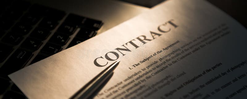 Pen for Signing the Contract. the Pen and Contract are on the Laptop ...