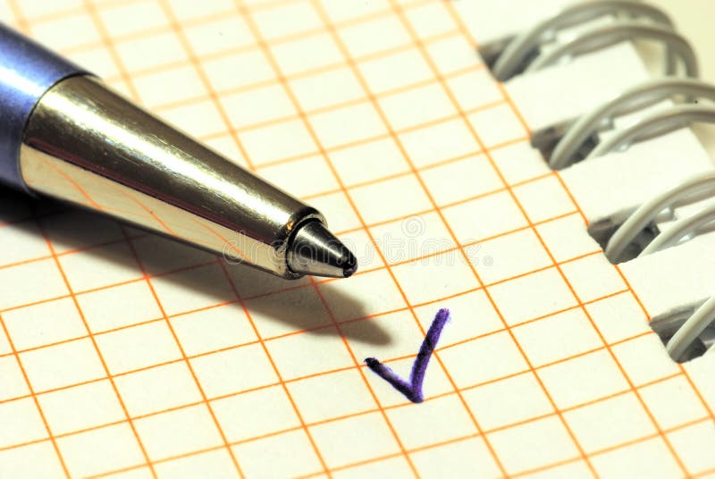 A pen and a tick mark stock photo. Image of approve, check - 12495580