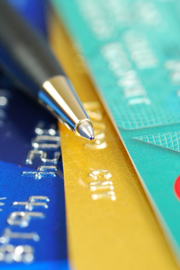 A Pen on the Top of Several Credit Cards Stock Image - Image of ...