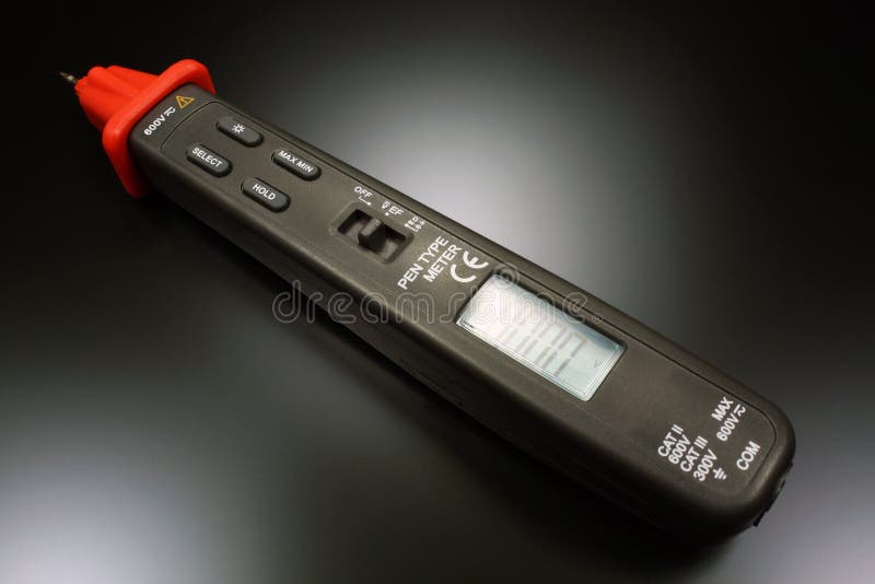 Pen Type Digital Multimeter On A Black Background Stock Photo - Image ...