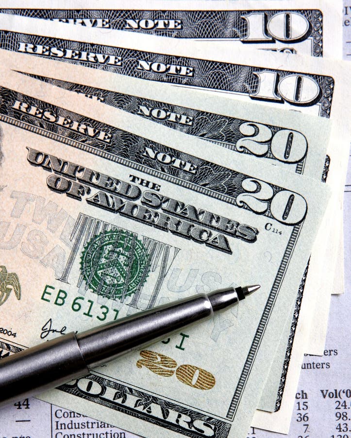 A pen on US currency stock photo. Image of foreign, exchange - 454088