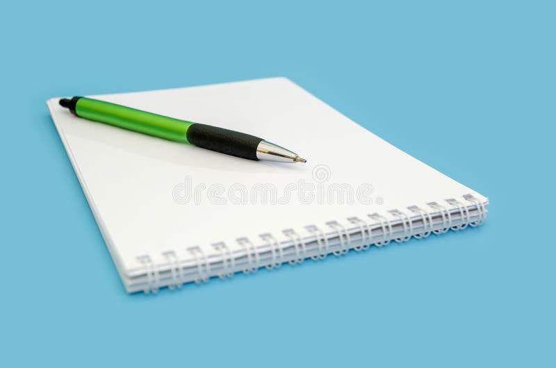 Blue Notepad and Blue Pen on a White Background Stock Image - Image of ...