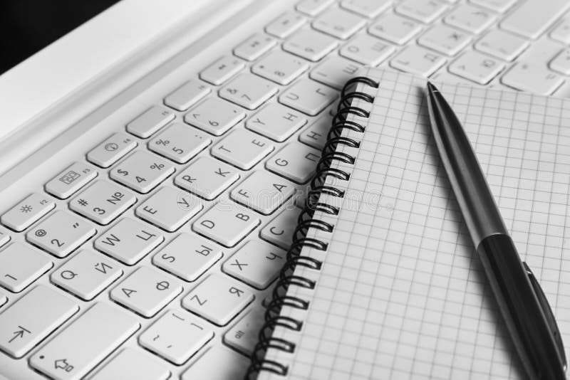 Notebook and Pen on Laptop Keypad Stock Image - Image of email, seminar ...