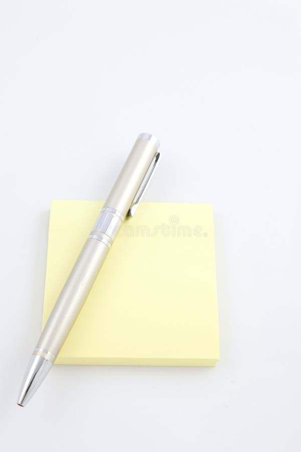 Pen on a Yellow Sticky Note Pad Stock Photo - Image of writing, sticky ...