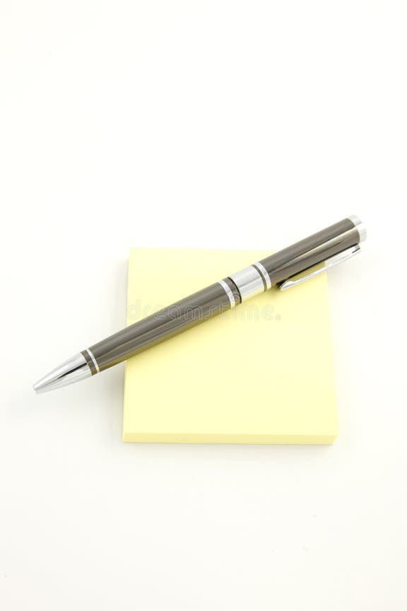 Pen on a Yellow Sticky Note Pad Stock Photo - Image of writing ...