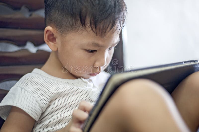 Kid`s Using Digital Touchscreen Phone Tablet Playing Online Games ...