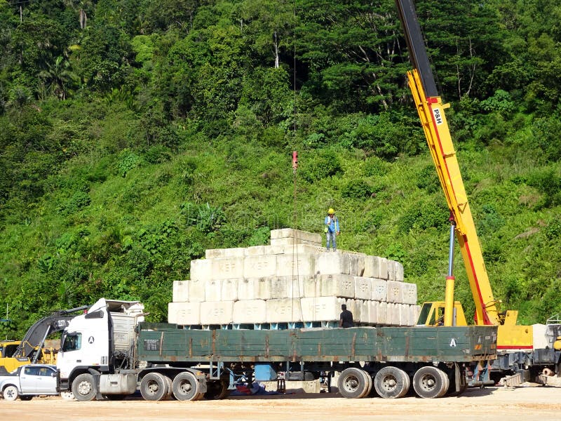 Construction Workers Stacking the Maintain Load Test Block Also Known ...