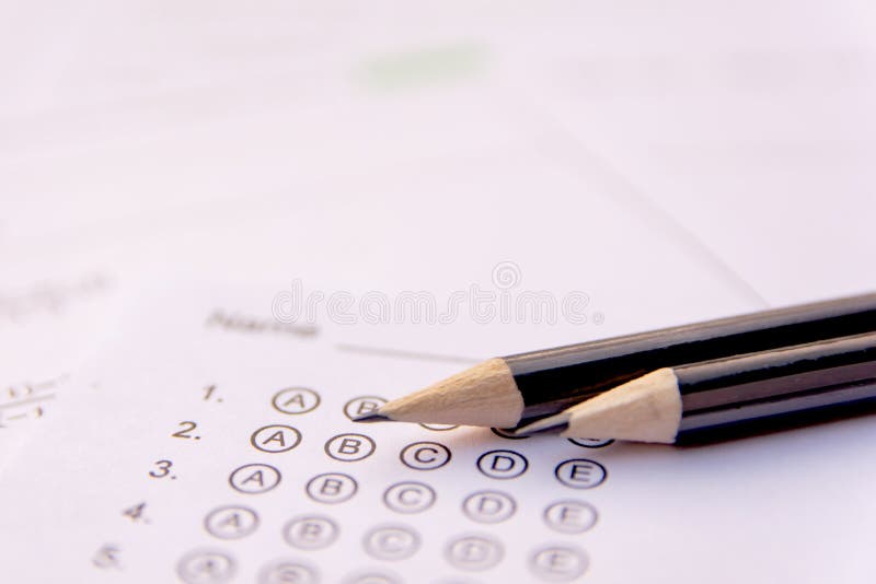 Pencil on Answer Sheets or Standardized Test Form with Answers Bubbled ...