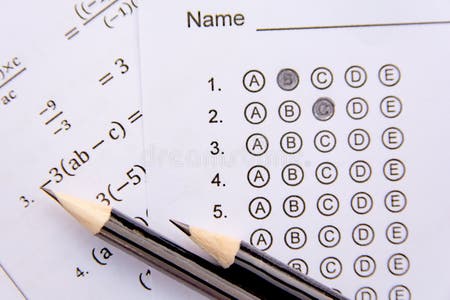 Pencil on Answer Sheets or Standardized Test Form with Answers Bubbled ...
