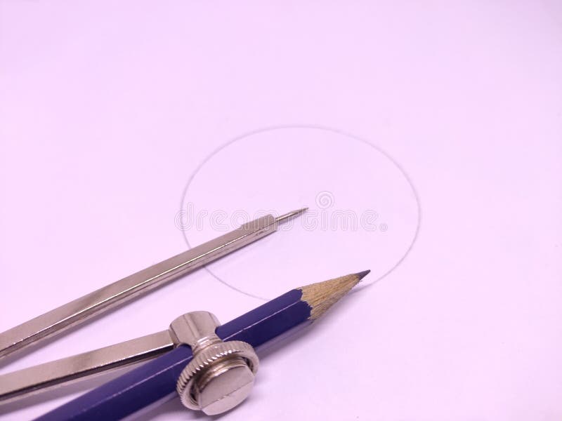 Pencil Attached with a Compass and a Circle Painted on White Paper ...