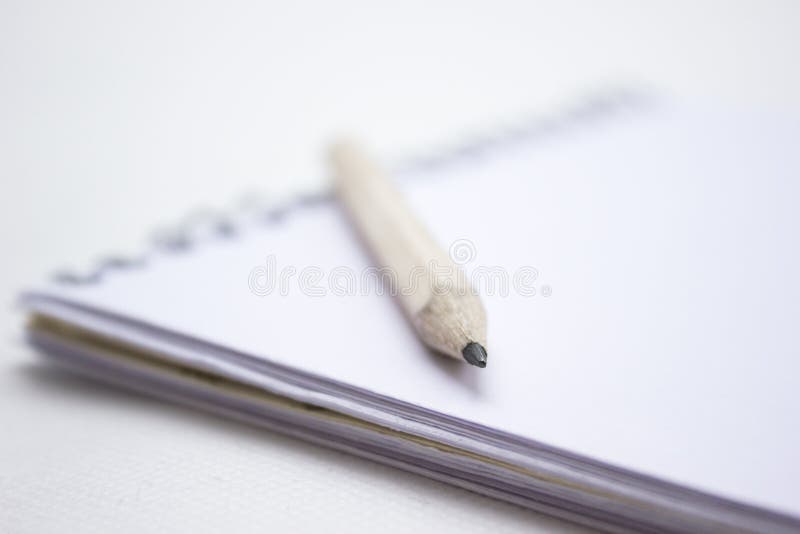 Pencil on a book stock photo. Image of office, orange - 37083388