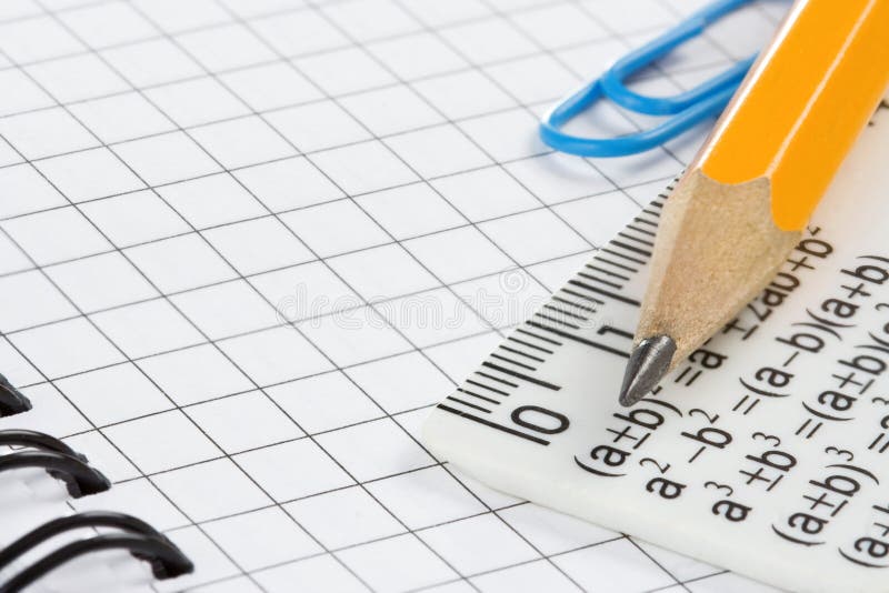 Pencil on checked notebook stock image. Image of accessory - 25858091