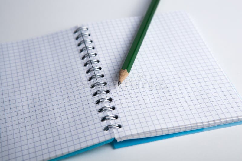 Pencil on the Checkered Paper Exercise Book Stock Photo - Image of ...