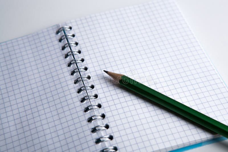Pencil on the Checkered Paper Exercise Book Stock Photo - Image of ...