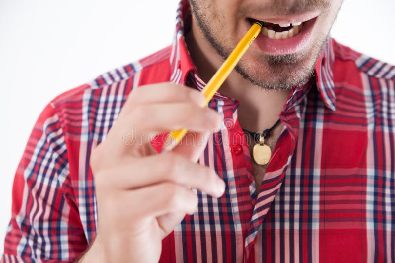 Pencil-chewing Man in Deep Thought Stock Image - Image of ...
