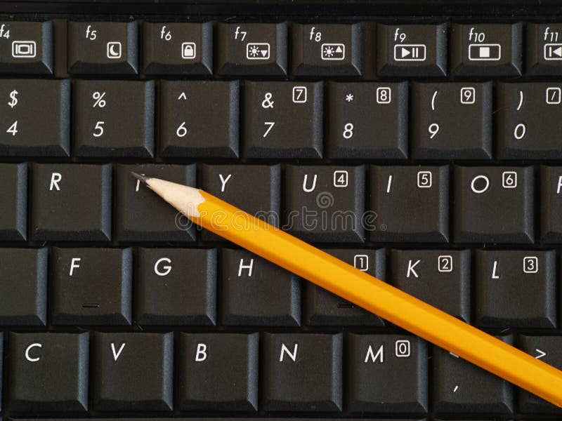 Pen on keyboard editorial photo. Image of keys, orange - 1427496