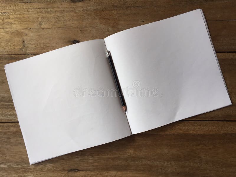 Pencil and Drawing Book on a Table Stock Image - Image of area, insert ...