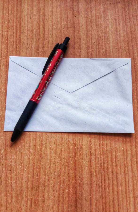 A Pencil and Envelope on the Table Stock Image - Image of pencil, table ...
