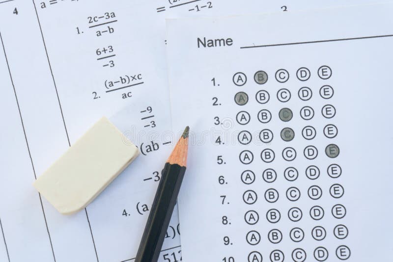 Pencil and Eraser on Answer Sheets or Standardized Test Form with ...