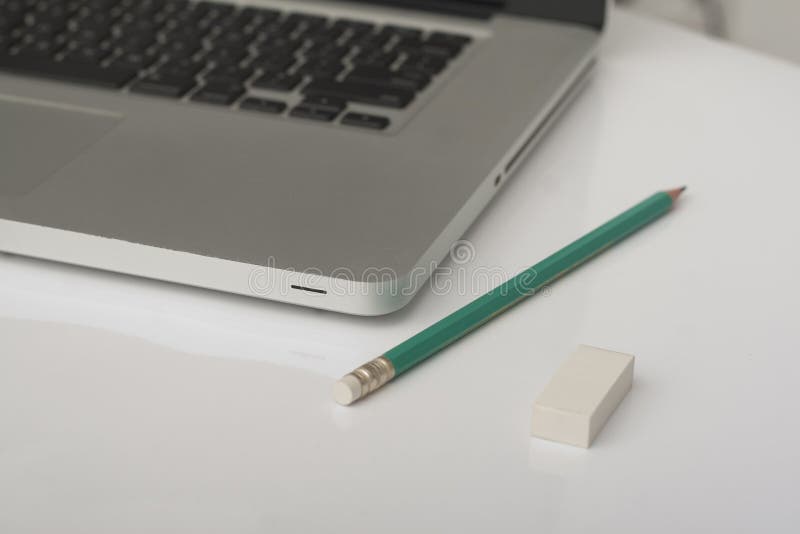 Pencil and Eraser Next To Laptop Stock Image - Image of employment ...