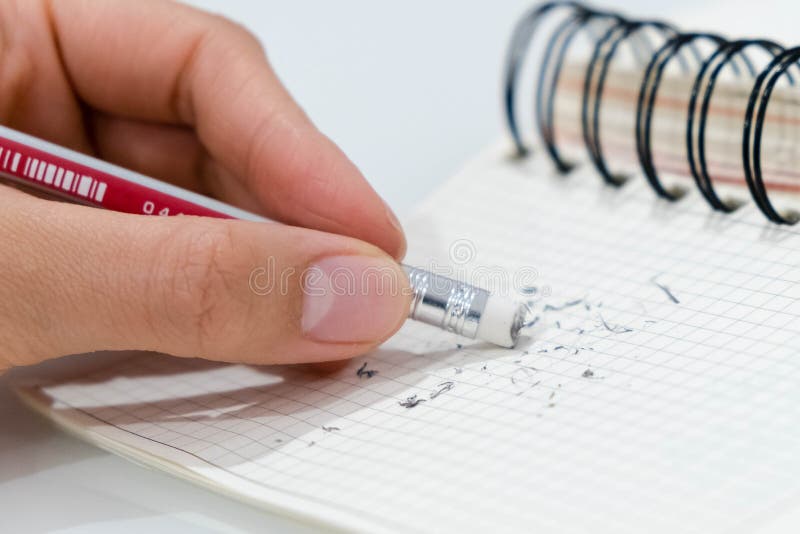 Pencil Eraser Removing a Written Mistake on a Note Book, School and ...