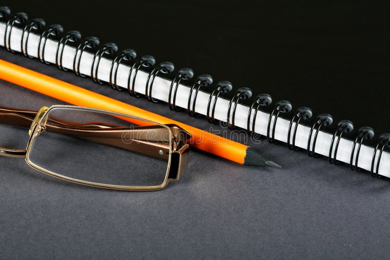 Pencil Glasses and a Writing-book Stock Image - Image of writing, lens ...