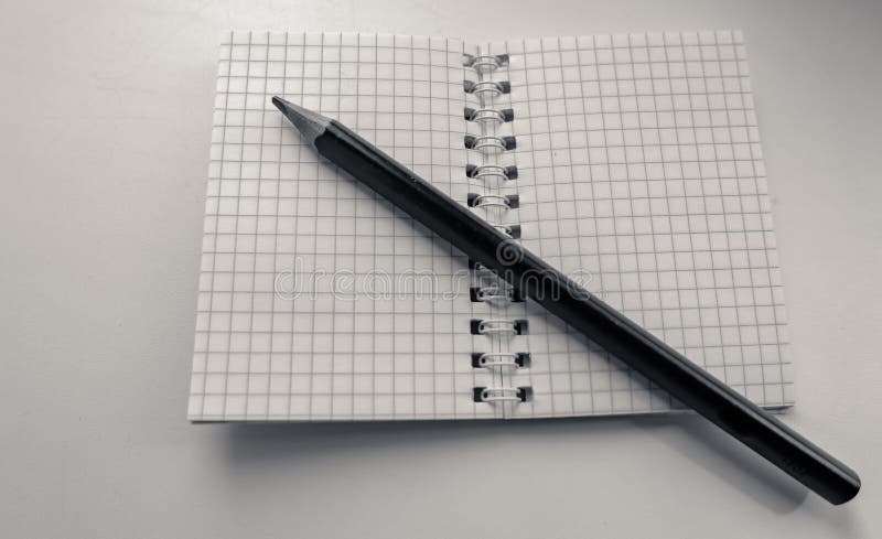 Pencil Lies on a White Notepad Stock Image - Image of cracked ...