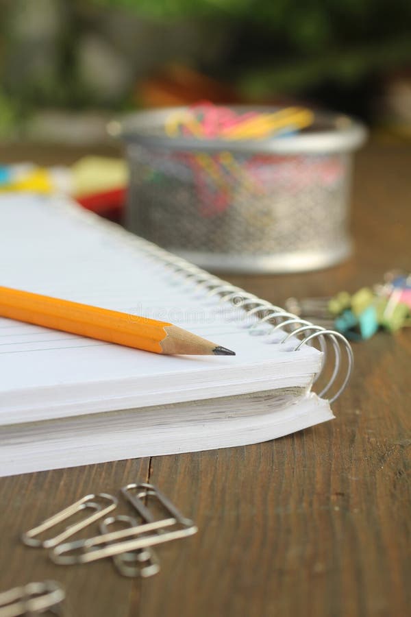 Pencil and notebook stock photo. Image of notebook, gear - 22852328