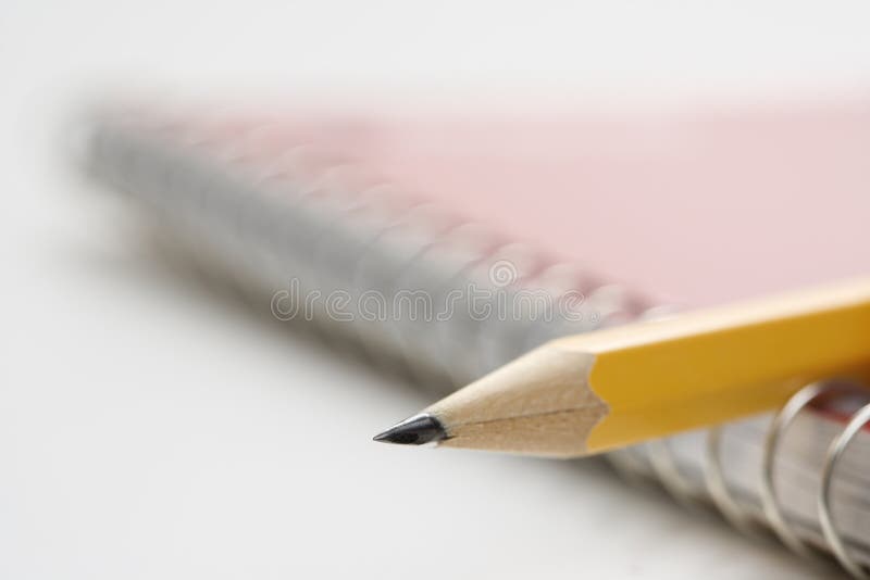 Pencil on notebook. stock image. Image of supplies, office - 2431519
