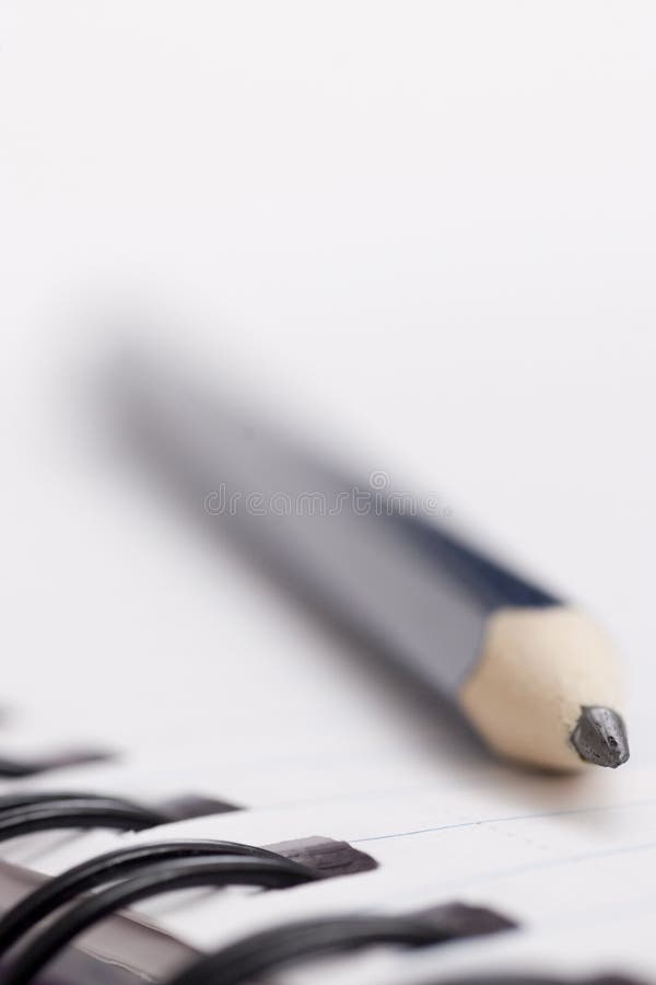 Pencil on notebook stock image. Image of school, paperwork - 2600773