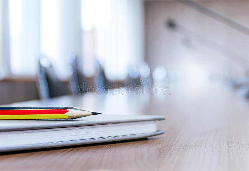 Pencil and Notebook on Table in Meeting Room Stock Photo - Image of ...