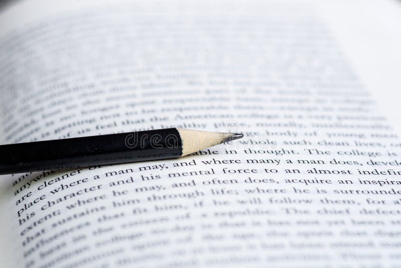 A pencil on the open book stock photo. Image of ollege - 174927000