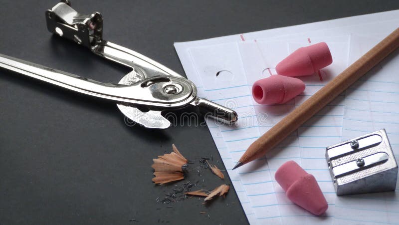 Pencil and Pink Erasers with Compass on Notepad Paper Stock Image ...