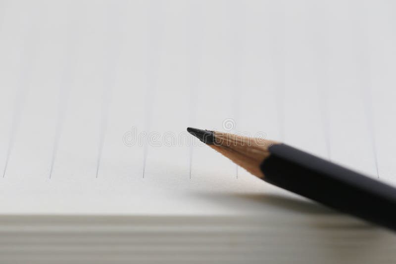 The Pencil Point To the Empty Area of Note Paper. Stock Photo - Image ...