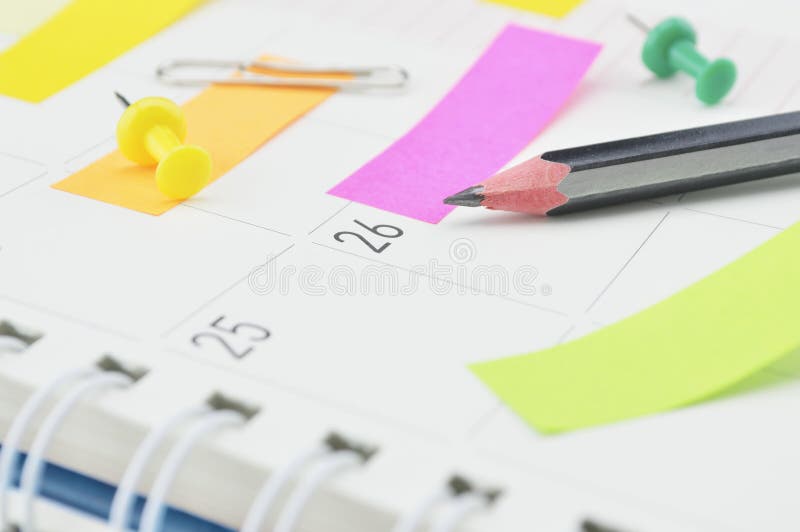 Pencil with Post it Notes and Pin on Business Diary Page Stock Image ...