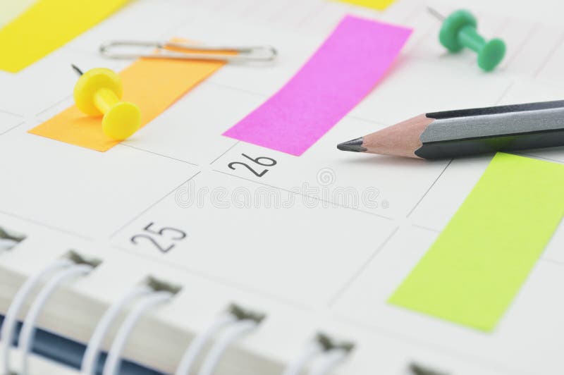 Pencil with Post it Notes and Pin on Business Diary Page Stock Photo ...
